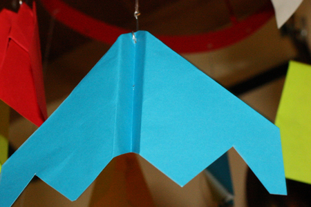 paper airplane mobile – decorative storage | Tally's Treasury