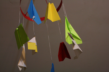 paper airplane mobile – decorative storage | Tally's Treasury